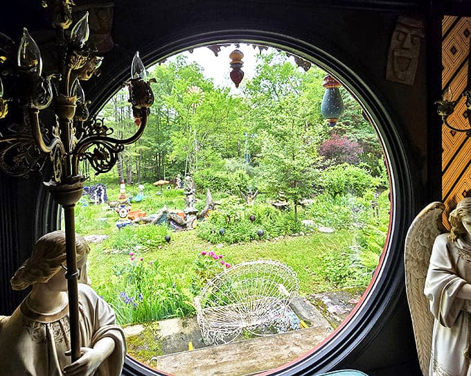 The round window frames the garden like a living painting, proving that at Luna Parc, even the views are carefully curated art.