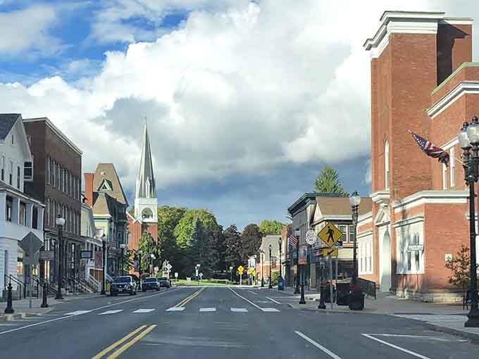 The church steeple rises above the trees like a beacon, guiding folks home just as it has for generations past.