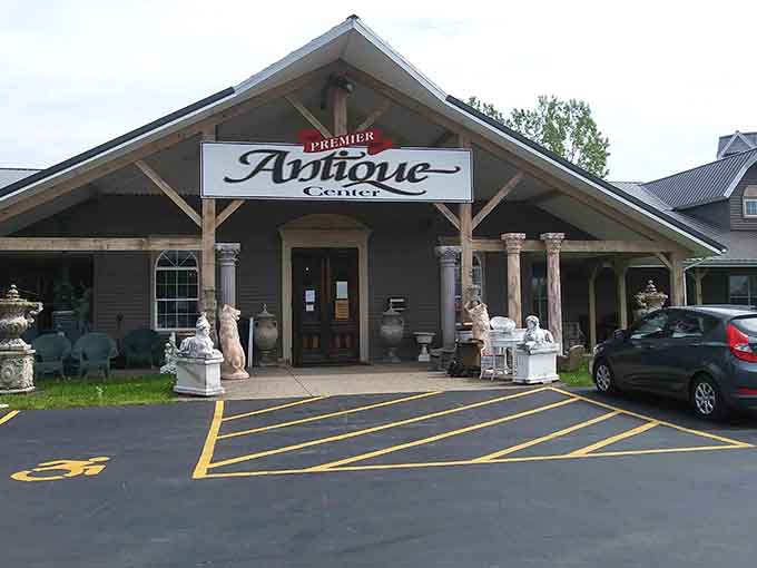 The elegant entrance with stone columns welcomes you into a world where antiques meet modern convenience.