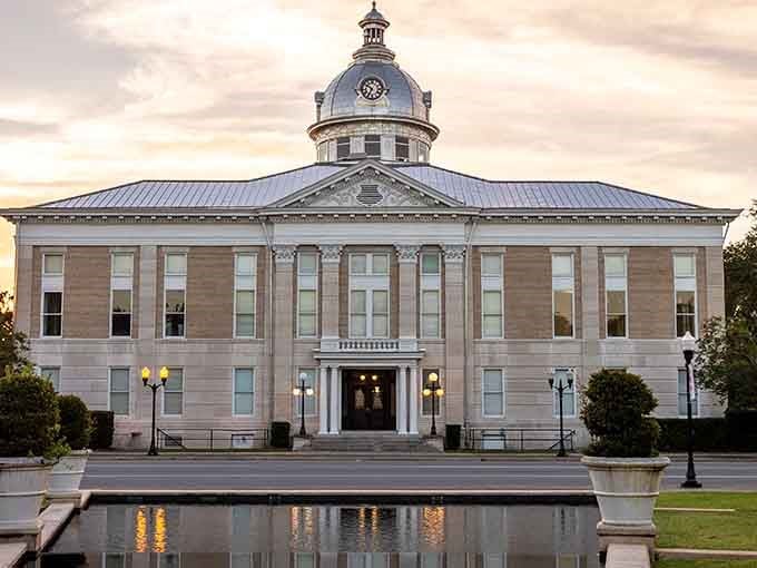 Classical columns and reflecting pool create a postcard-perfect government building that actually looks dignified, imagine that.