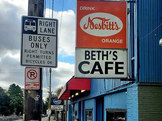 The bold blue exterior and vintage Nesbitt's sign make this spot impossible to miss on your breakfast quest.