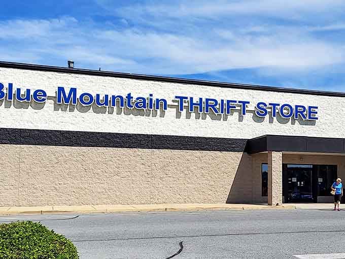 Bold blue letters announce this treasure trove against cream-colored walls, promising mountains of deals inside that spacious interior.