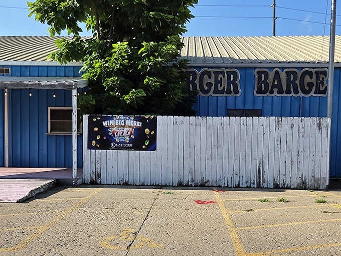 The Burger Barge's weathered blue exterior looks like it might actually float away with the next big wave.