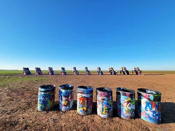 Ten vintage Cadillacs buried nose-first create an automotive Stonehenge that invites visitors to add their own colorful contributions.