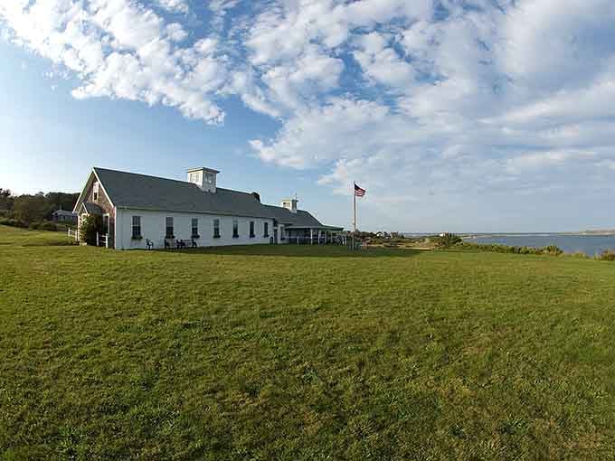 The white chapel stands proud against blue skies, looking like it's been waiting patiently for your Sunday visit.