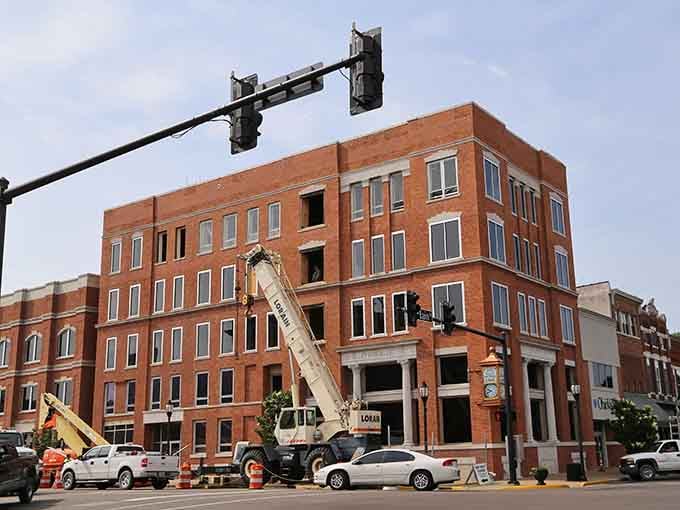 Construction cranes signal growth without the growing pains, as this city builds its future on affordable foundations.