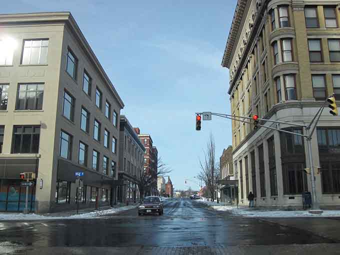 Winter's quiet blanket softens the downtown streets where even the snow seems to fall more gently than elsewhere.
