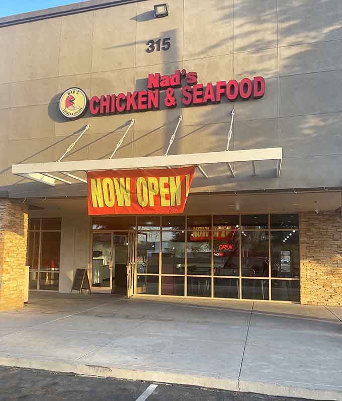 Nad's modern storefront promises fresh chicken and seafood, but locals know the real star is that golden fried perfection.