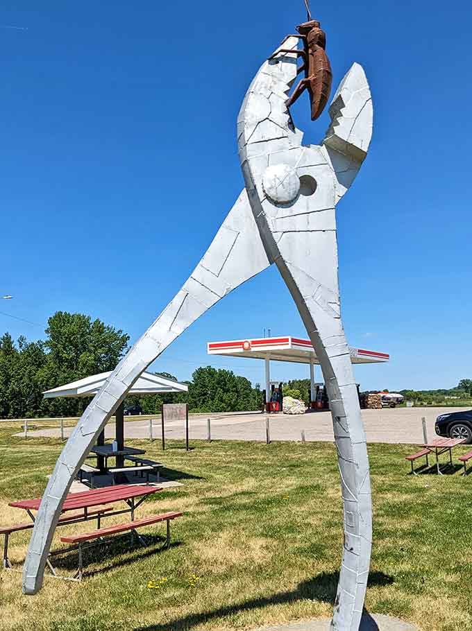 Giant pliers grip the sky in Vining's sculpture park, where everyday tools become extraordinary works of roadside art.