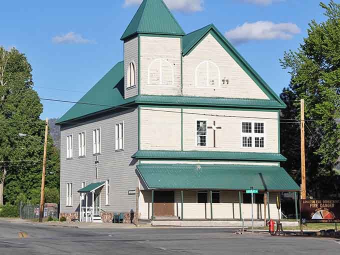 This historic structure with its green trim stands tall like a sentinel watching over generations of mountain visitors.