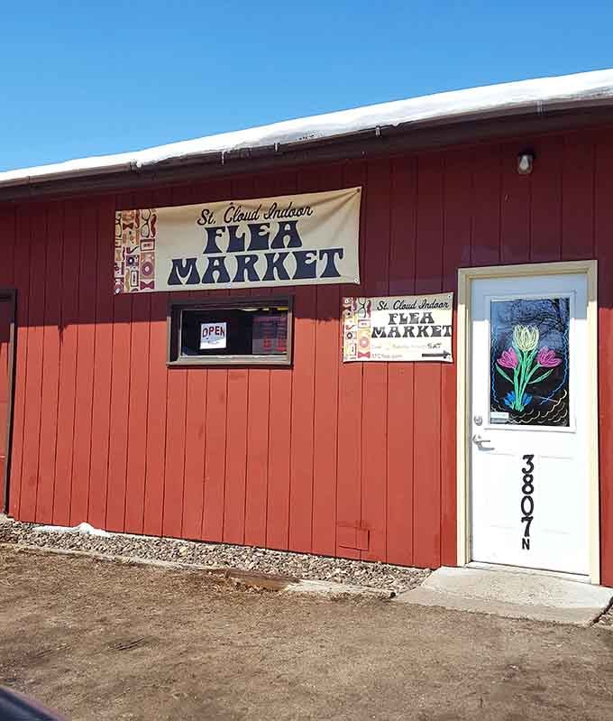 The cheerful red barn exterior with its hand-painted tulip welcomes bargain hunters like an old friend greeting you at home.