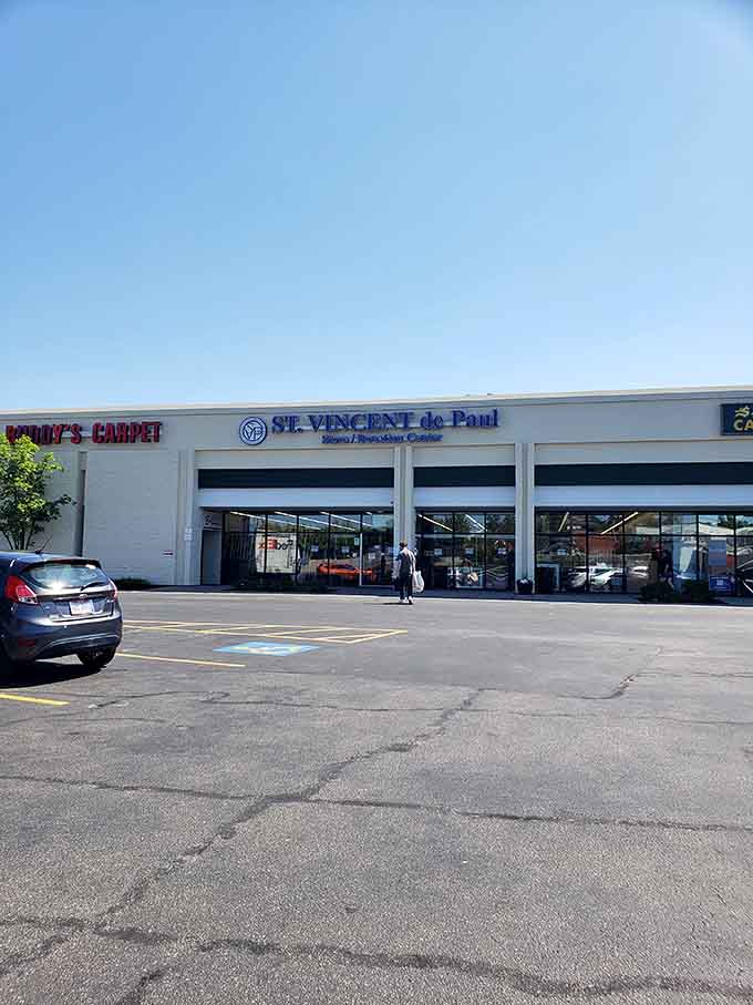 Those wide-open garage doors welcome everyone to a bright, spacious thrift store where community support meets smart shopping.