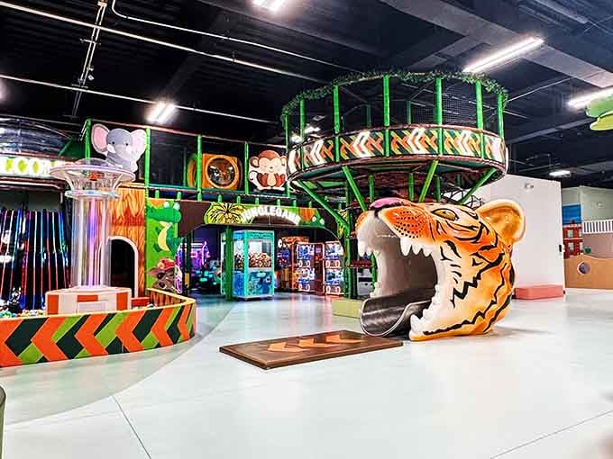 A friendly tiger slide beckons children forward, its cheerful face promising adventures through tunnels and towers above.