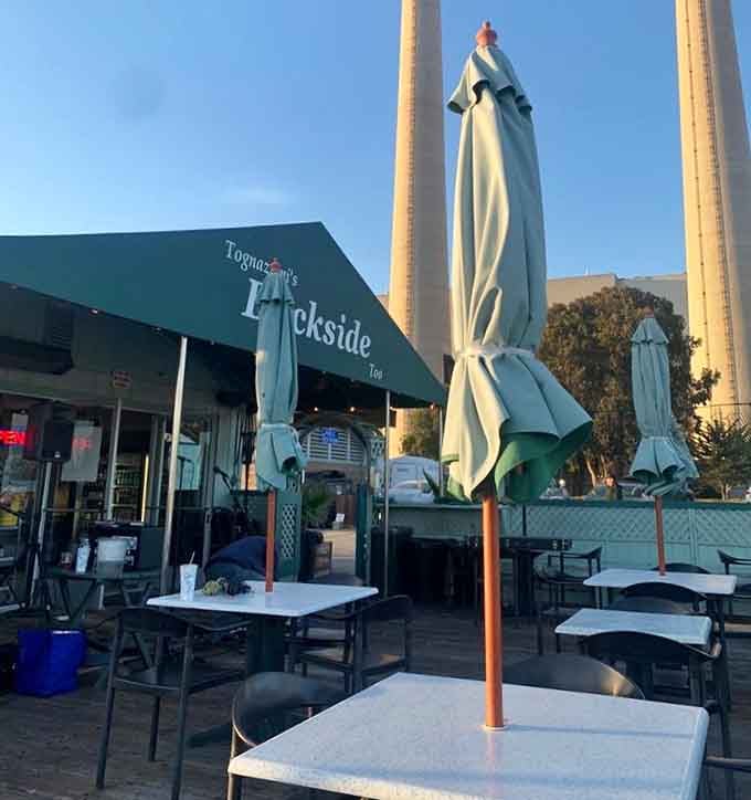 Tognazzini's green awning signals "seafood sanctuary ahead." With Morro Rock standing guard, this spot serves up views as delicious as the fish.