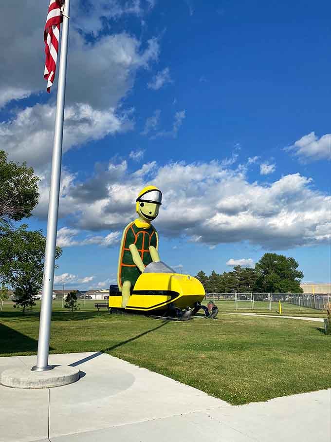 Tommy Turtle sports his safety-first snowmobile helmet, ready for winter adventures in the Turtle Mountains.