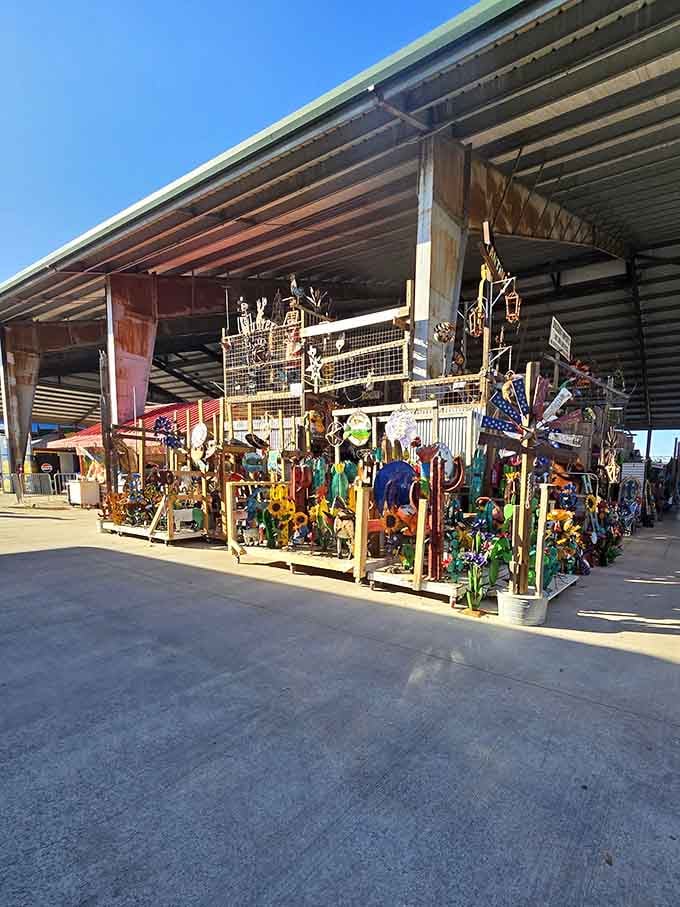 Metal yard art and colorful garden decorations create an outdoor gallery that would make any lawn the neighborhood showstopper.
