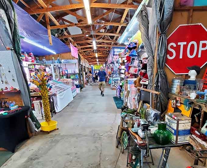 The exposed beams and eclectic merchandise create an atmosphere somewhere between barn sale and boutique shopping.
