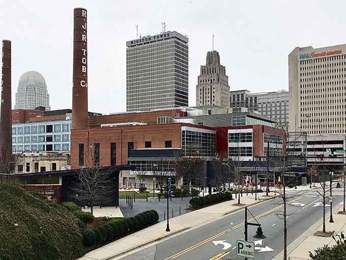 Industrial charm meets city sophistication in Winston-Salem, where brick smokestacks stand proud beside gleaming downtown towers.