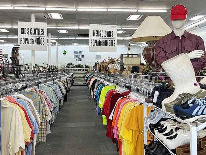 Inside American Thrift, organized racks stretch as far as the eye can see. Their bilingual signage welcomes all treasure hunters!