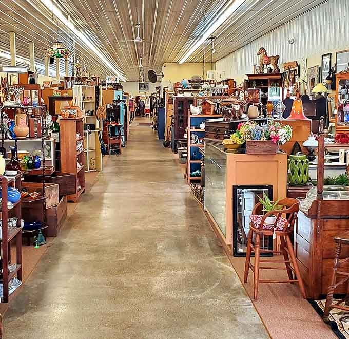 That corrugated ceiling soars above endless rows of furniture and collectibles arranged in perfect browsing order.