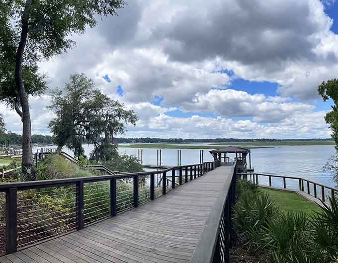 This waterfront boardwalk stretches toward the horizon, inviting contemplation and maybe a few deep breaths of fresh air.