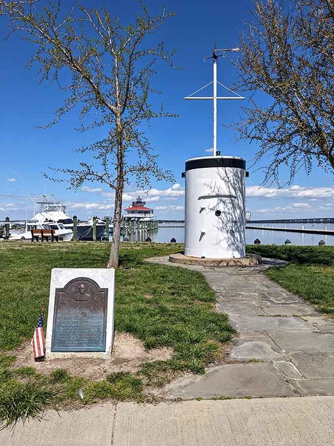 That maritime marker stands watch over the waterfront, reminding everyone that history happened right here on this spot.