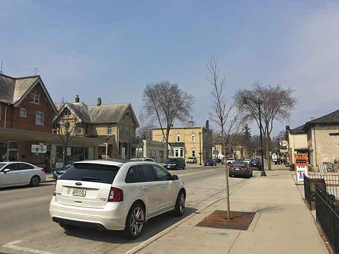 Tree-lined streets create a canopy of green that makes every stroll feel like a peaceful escape.