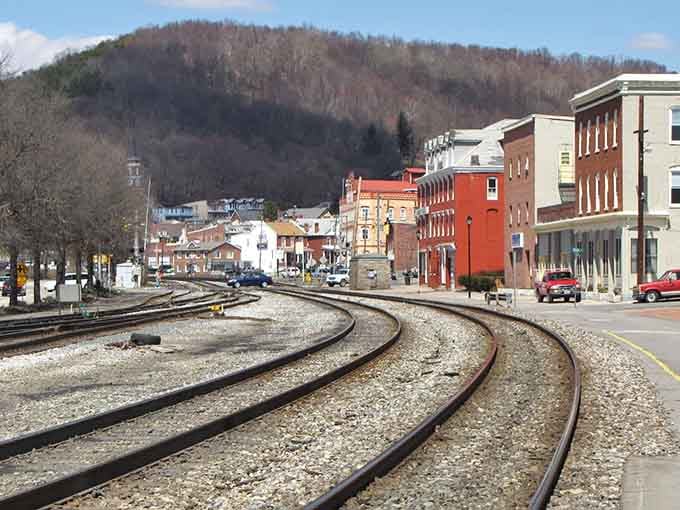 Railroad tracks sweep through downtown like steel rivers, reminding us when trains were the lifeline of American commerce.