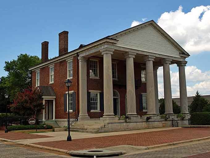 Those grand columns command respect like a Southern gentleman in his Sunday best at church.
