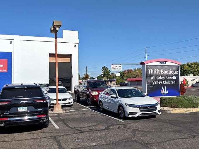 The parking lot view shows a welcoming storefront where thrifting supports a cause worth celebrating every visit.