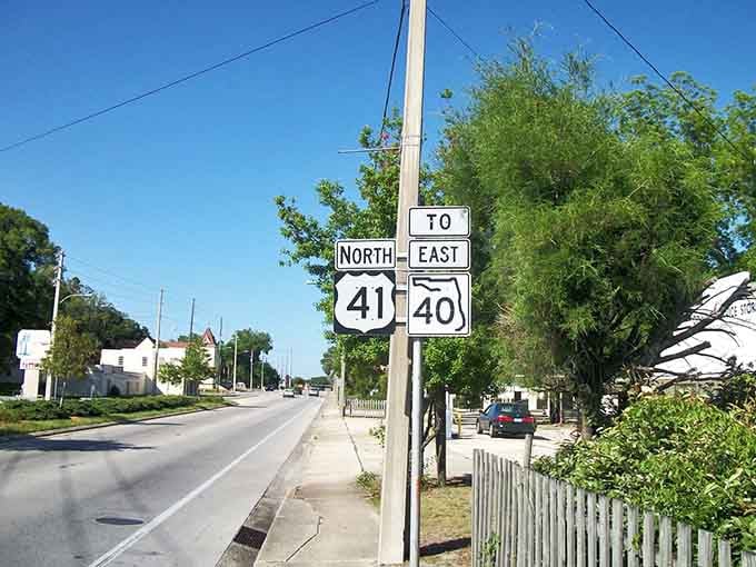 Highway signs point toward destinations, but the real treasure is this quiet stretch of authentic old Florida.