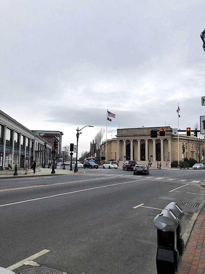 Wide streets and classic architecture create an intersection where past and present shake hands daily.