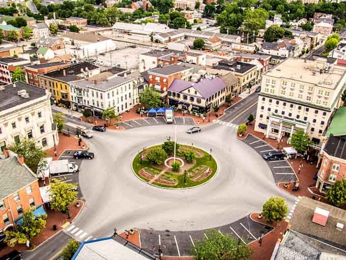 From above, the town square reveals its perfect circular design, a gathering place that's worked for generations.