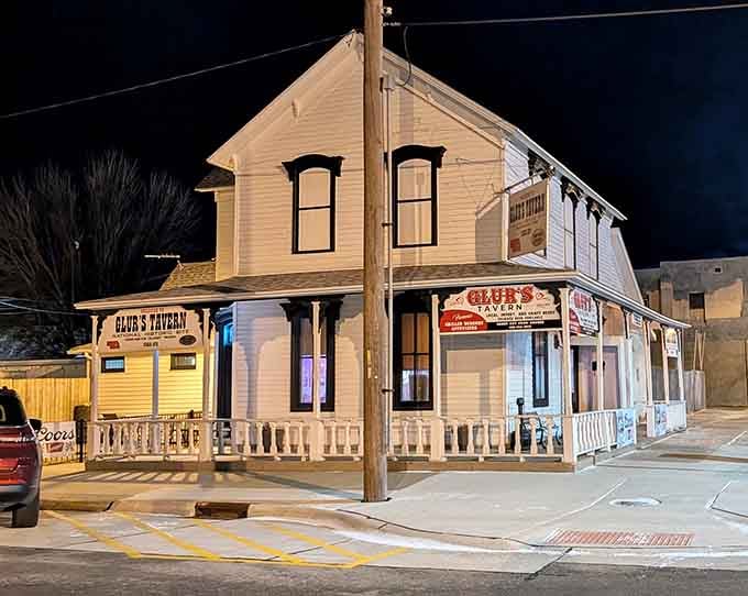 Night or day, this historic tavern's porch welcomes hungry visitors to step back in time for a thoroughly modern burger experience.