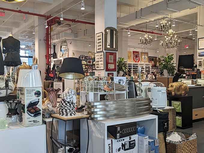 Chandeliers dangle above home goods like fancy jewelry, proving thrift stores can have serious style.
