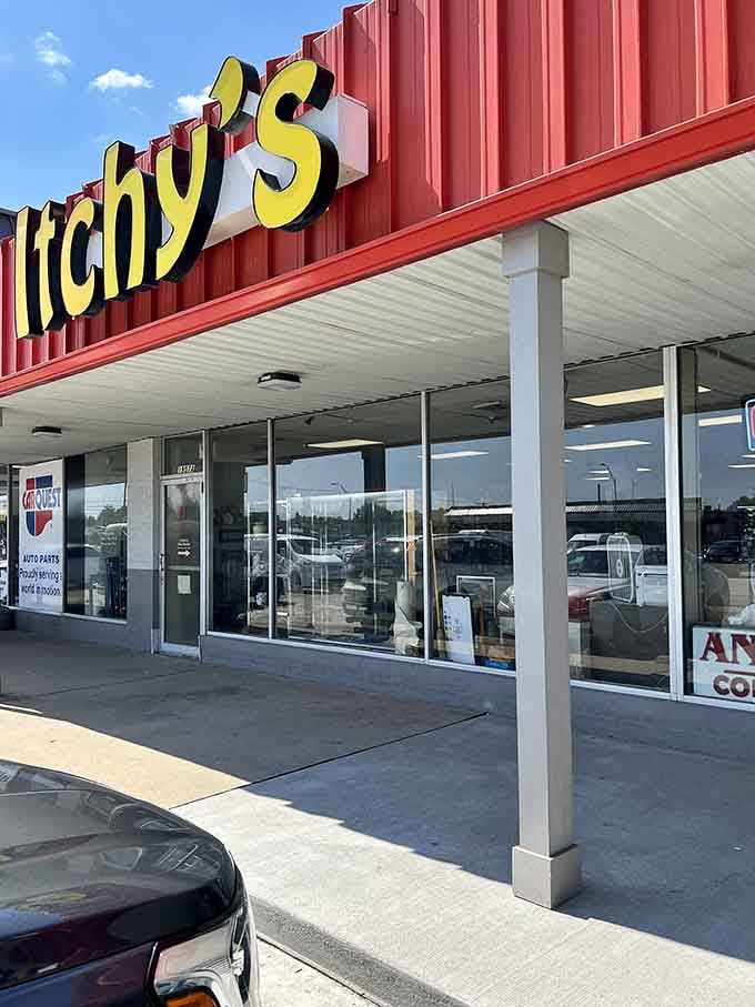 The retro-style lettering pops against the corrugated metal, inviting shoppers to scratch their treasure-hunting itch inside.