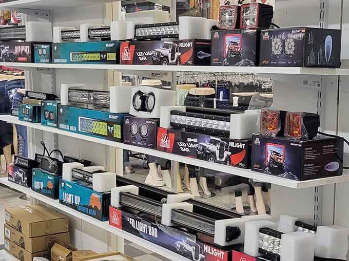 LED light bars stacked on white shelving prove that modern gadgets and flea market prices can coexist beautifully.