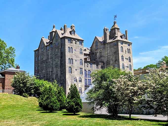 A concrete castle rising from Pennsylvania hills, where architectural dreams meet blue skies and endless curiosity.