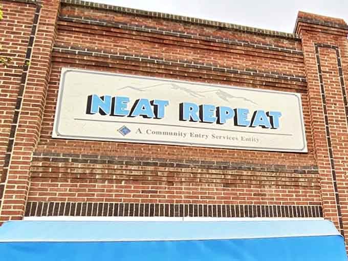 Neat Repeat's bold blue sign promises exactly what thrifters crave &ndash; a well-organized treasure hunt where one person's castoffs become another's prized finds.