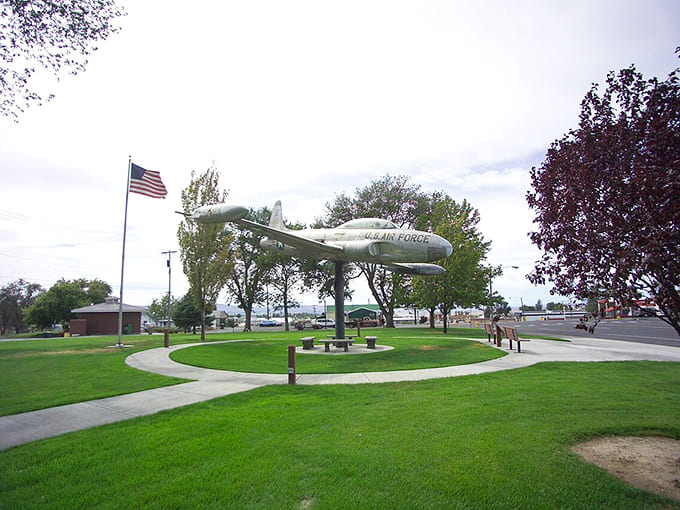 A vintage Air Force jet stands proudly in the park, reminding everyone that small towns have big stories.
