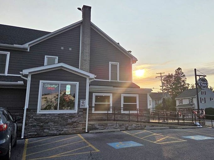 As the sun sets on this Jonestown gem, the real magic is just beginning inside where pizza dreams come true.