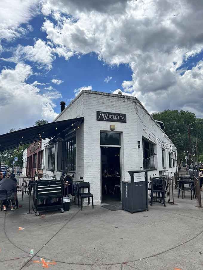 Bright white walls and industrial windows make Pizzicletta stand out in Flagstaff's historic downtown. Pizza with architectural character!