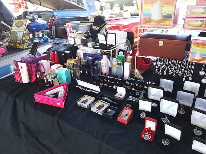 Jewelry boxes and accessories spread across the table like a pirate's treasure chest opened just for you.