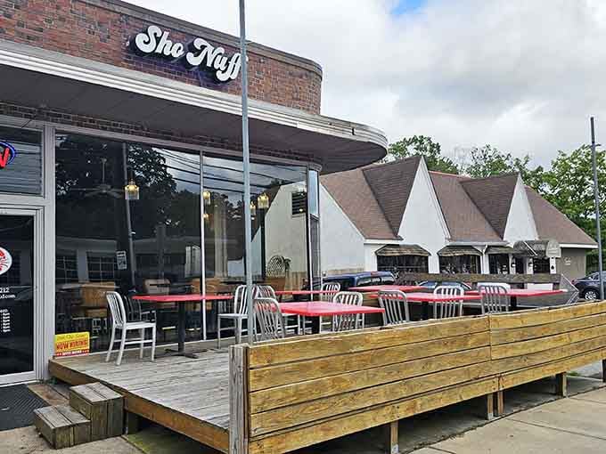 That wooden deck with red-topped tables creates the perfect spot for enjoying seafood in the fresh Carolina air.