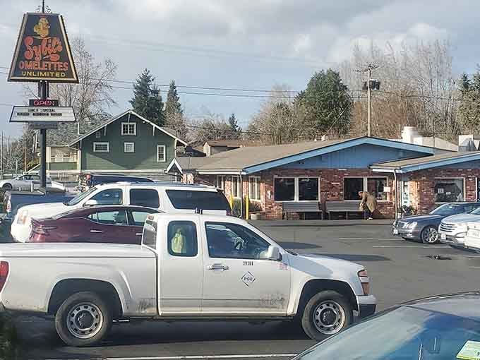 That vintage sign promising unlimited omelets is basically a beacon of hope for anyone who takes breakfast seriously.
