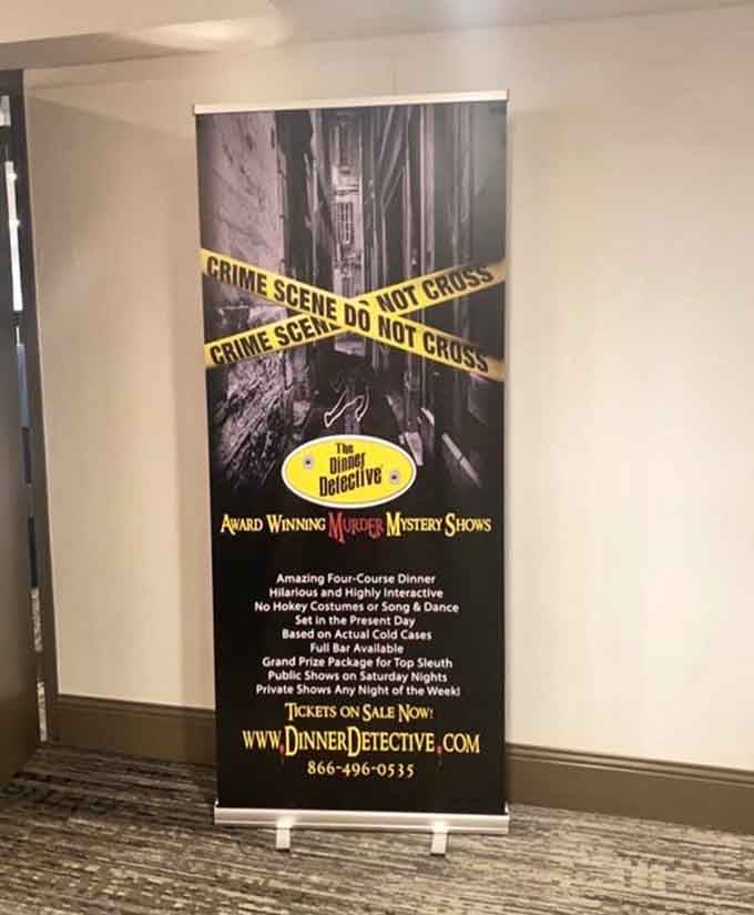 The hallway display sets the stage for an interactive whodunit where you're both diner and sleuth simultaneously.