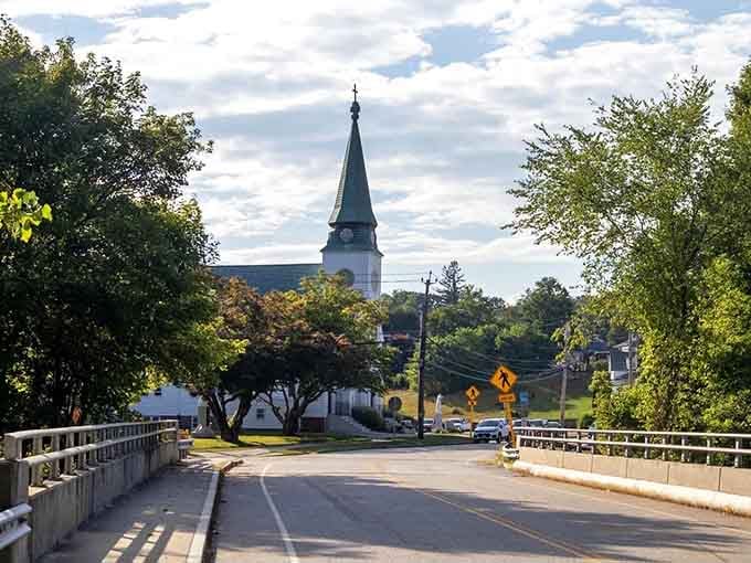 Tree-lined streets lead your eye toward the steeple, where the road itself seems to bow in respectful acknowledgment.