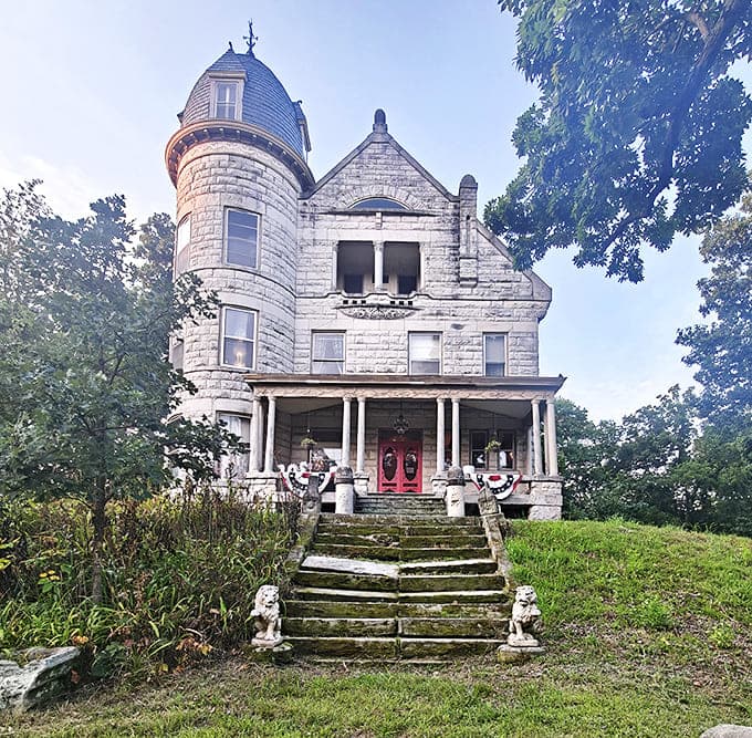 This stone tower and red doors of Warner Castle create a striking contrast that makes this hidden gem worth discovering.