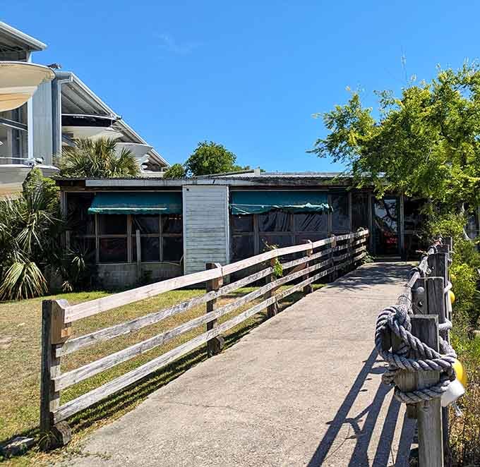 That weathered dock leading to the entrance has seen countless happy diners walk across it toward some seriously good coastal cooking.