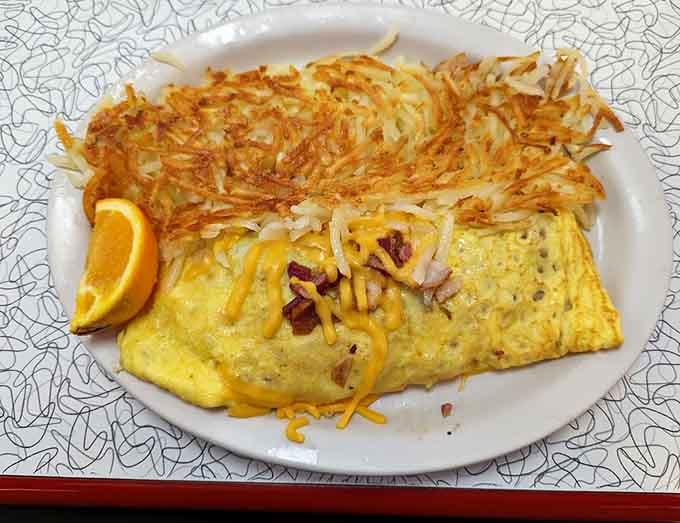 This loaded omelet with hash browns shows that breakfast here means business, delicious business.